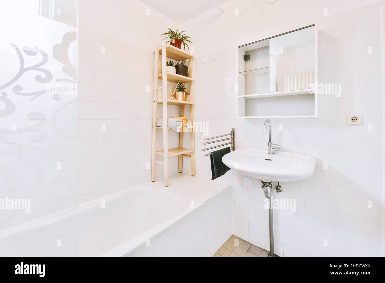 Modern bathroom design with toilet and convenient storage shelves Stock ...