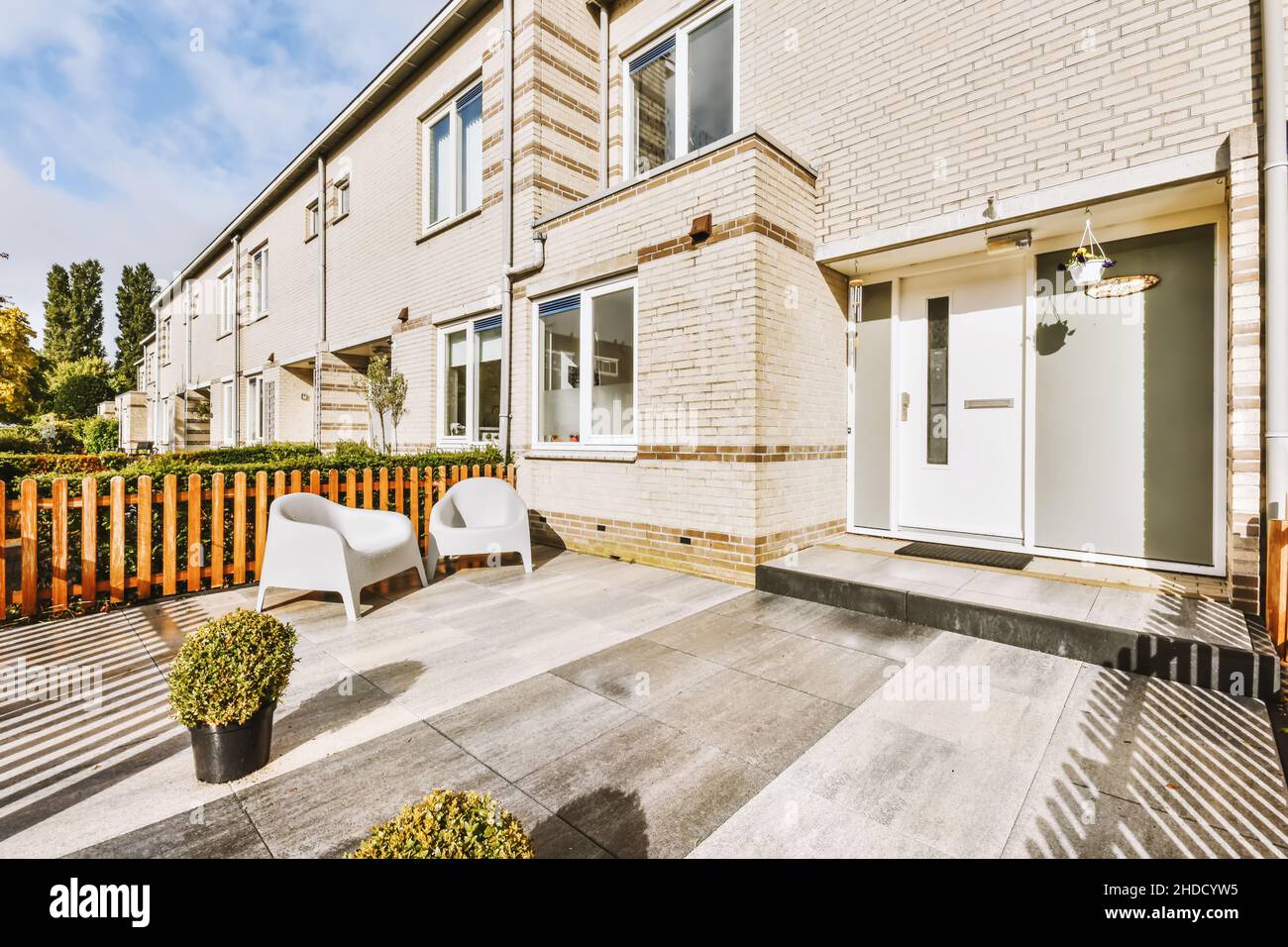 nice courtyard with greenery and a comfortable seating area Stock Photo ...