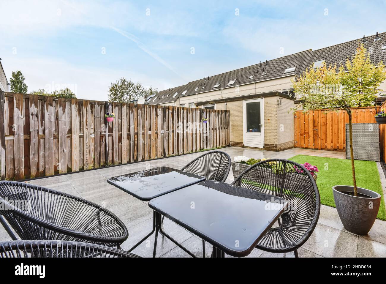 nice courtyard with greenery and a comfortable seating area Stock Photo ...