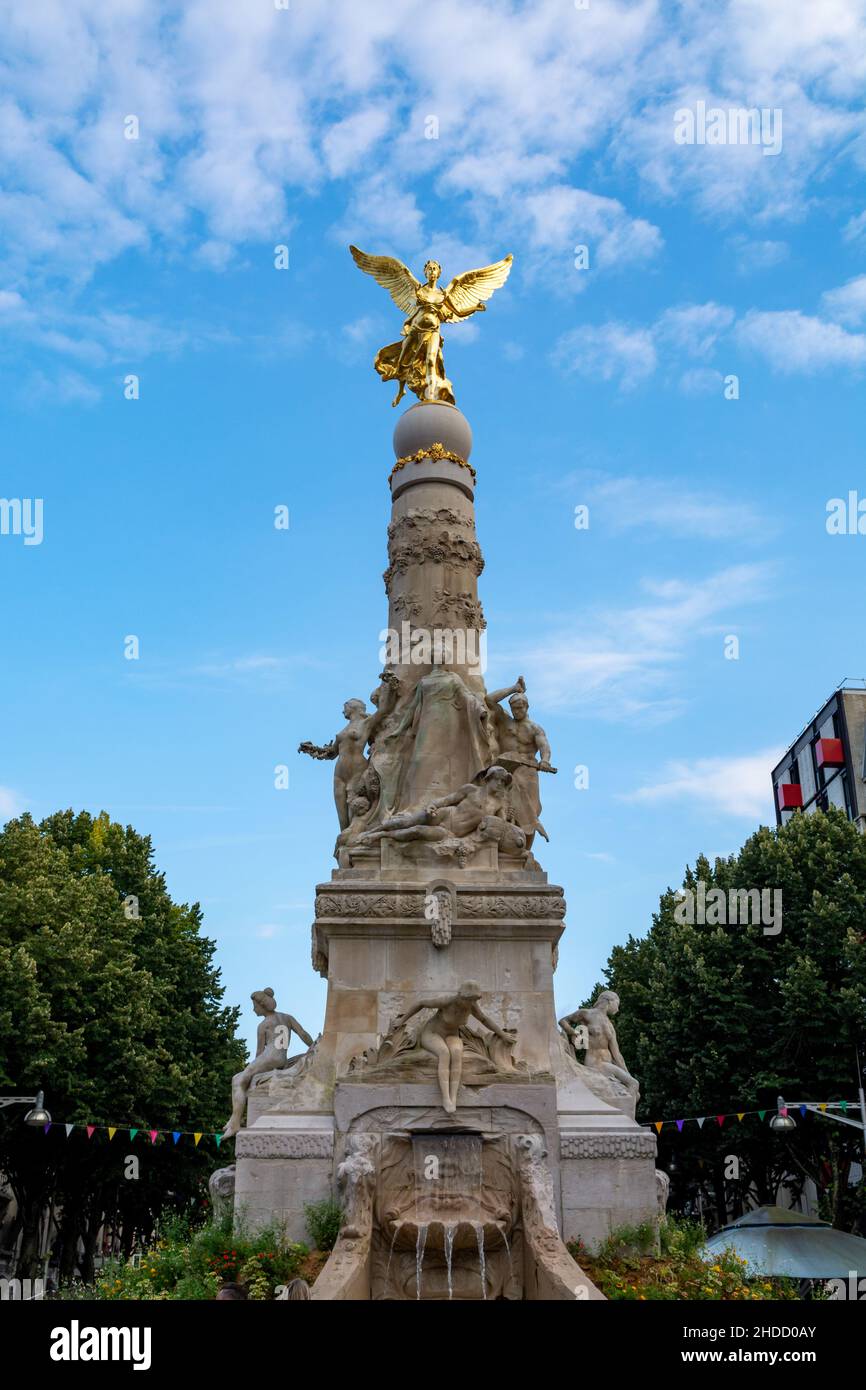 Walking on streets in central part of old French city Reims with famous ...
