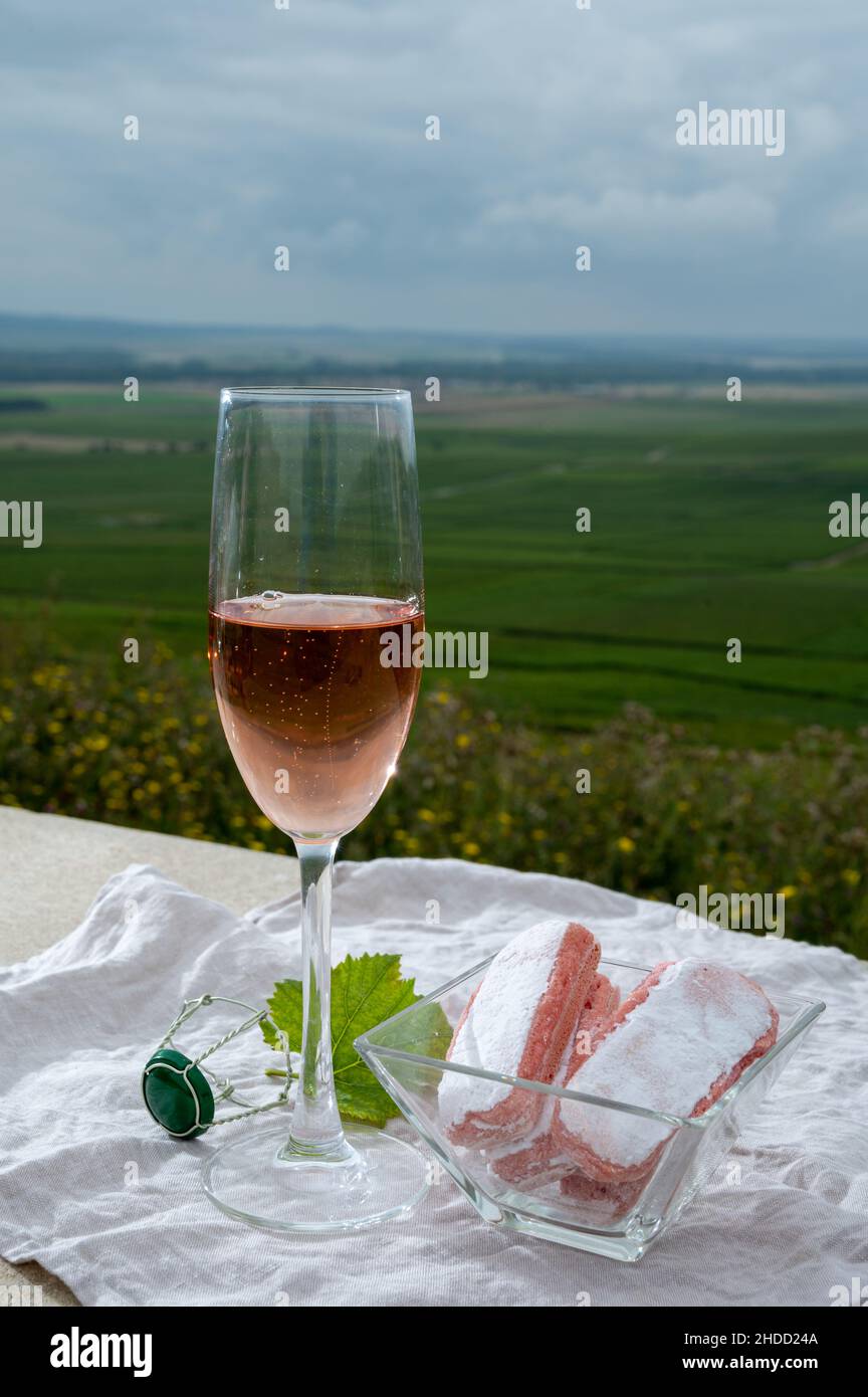 Symbols of Reims, rose brut champagne wine and rose biscuits and view ...