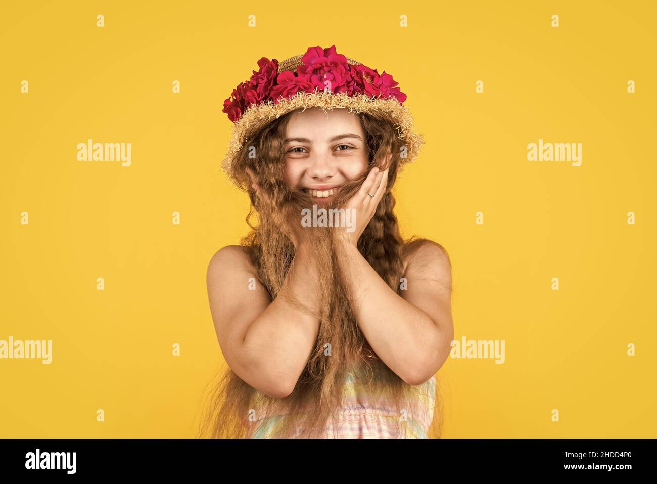 happy kid girl in straw hat with rose flowers, happiness Stock Photo ...