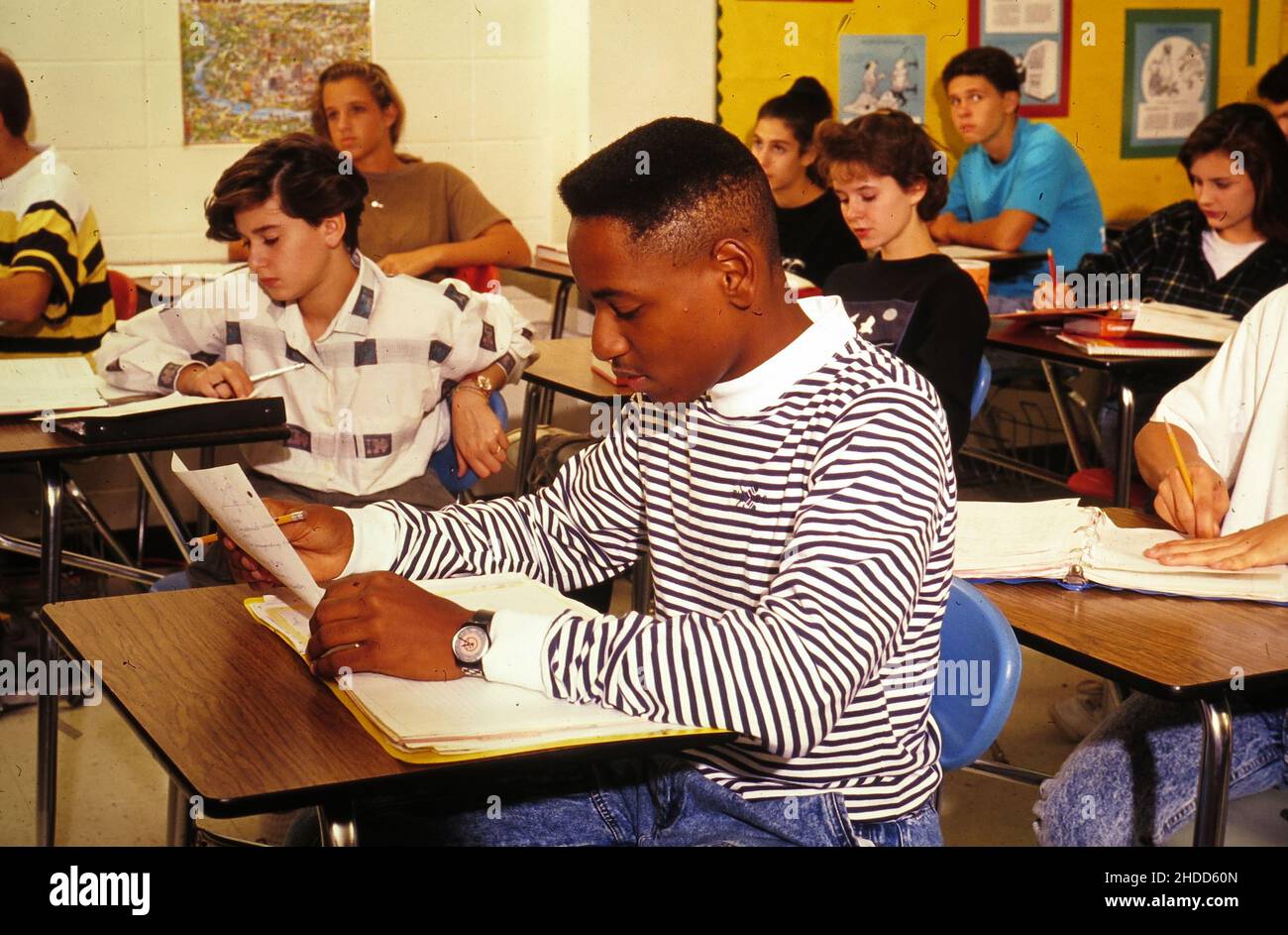 Austin Texas USA, 1993: Students look over test results in math class ...
