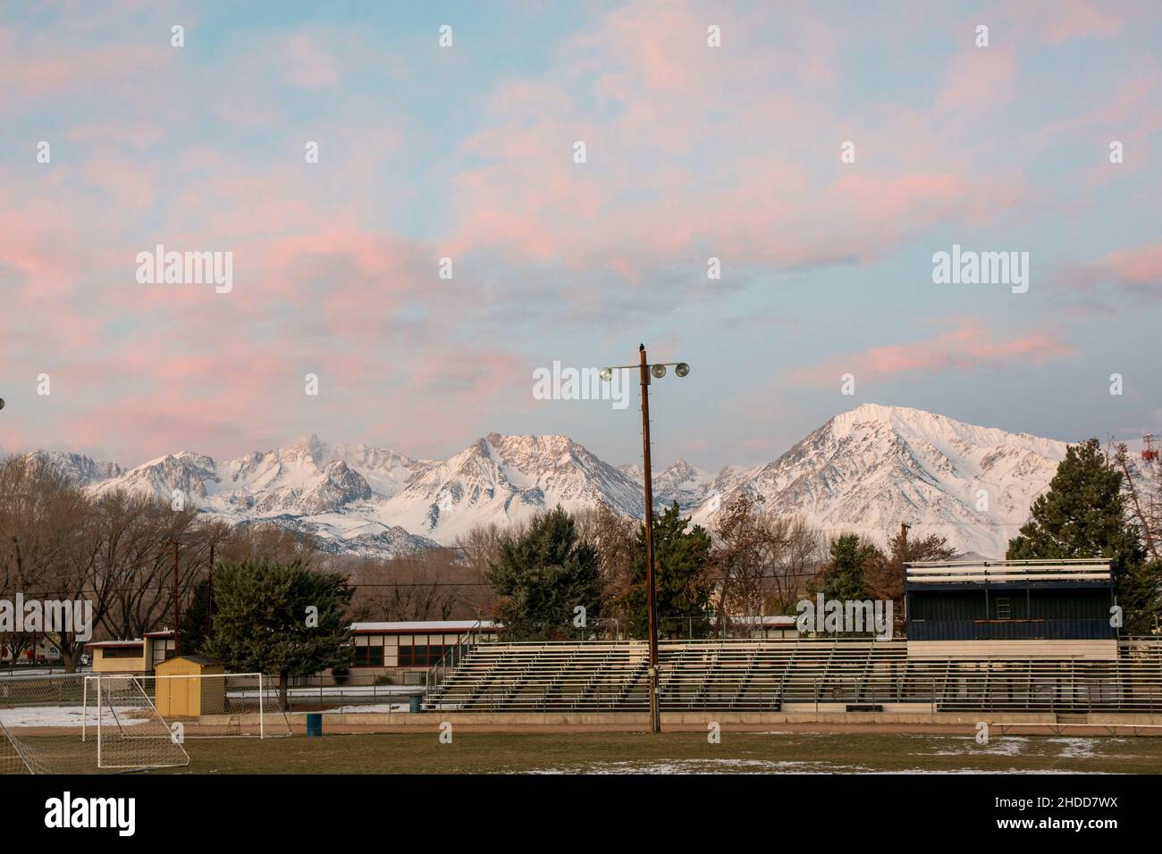 The Eastern Sierra peaks above Bishop, Inyo County, CA, USA light up ...