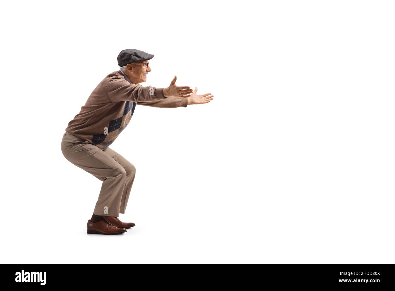 Full length profile shot of an elderly man standing with arms wide open ...