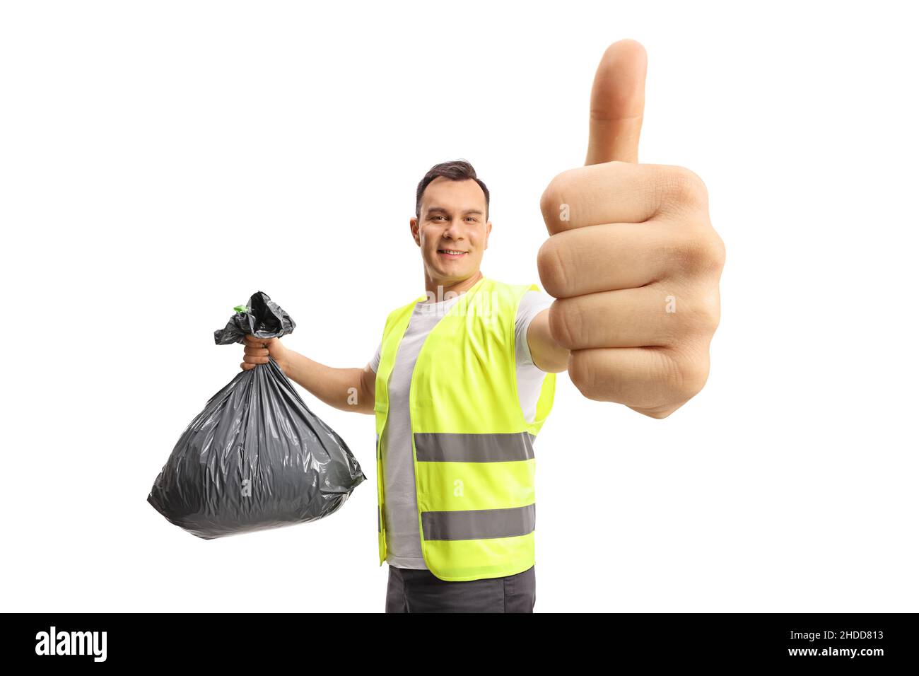 Waste collector holding a bin bag and gesturing thumbs up isolated on ...