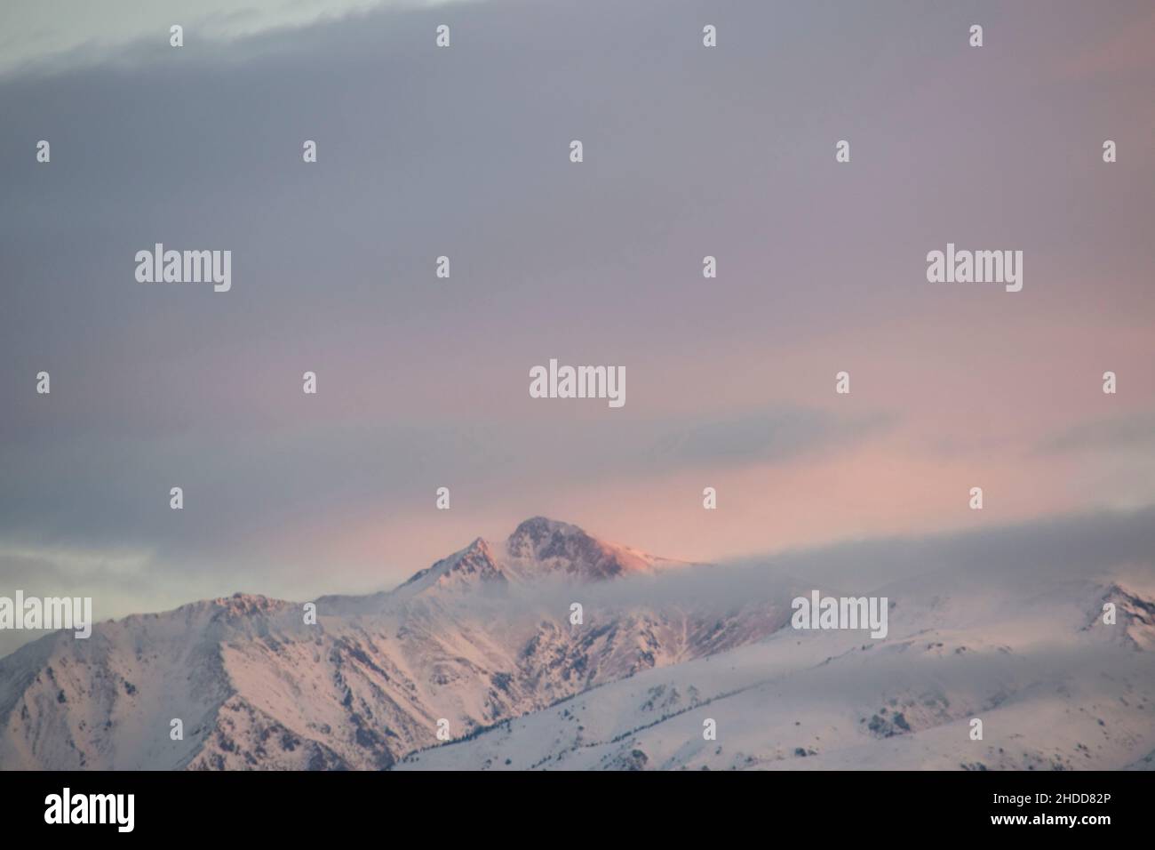 The Eastern Sierra peaks above Bishop, Inyo County, CA, USA light up ...