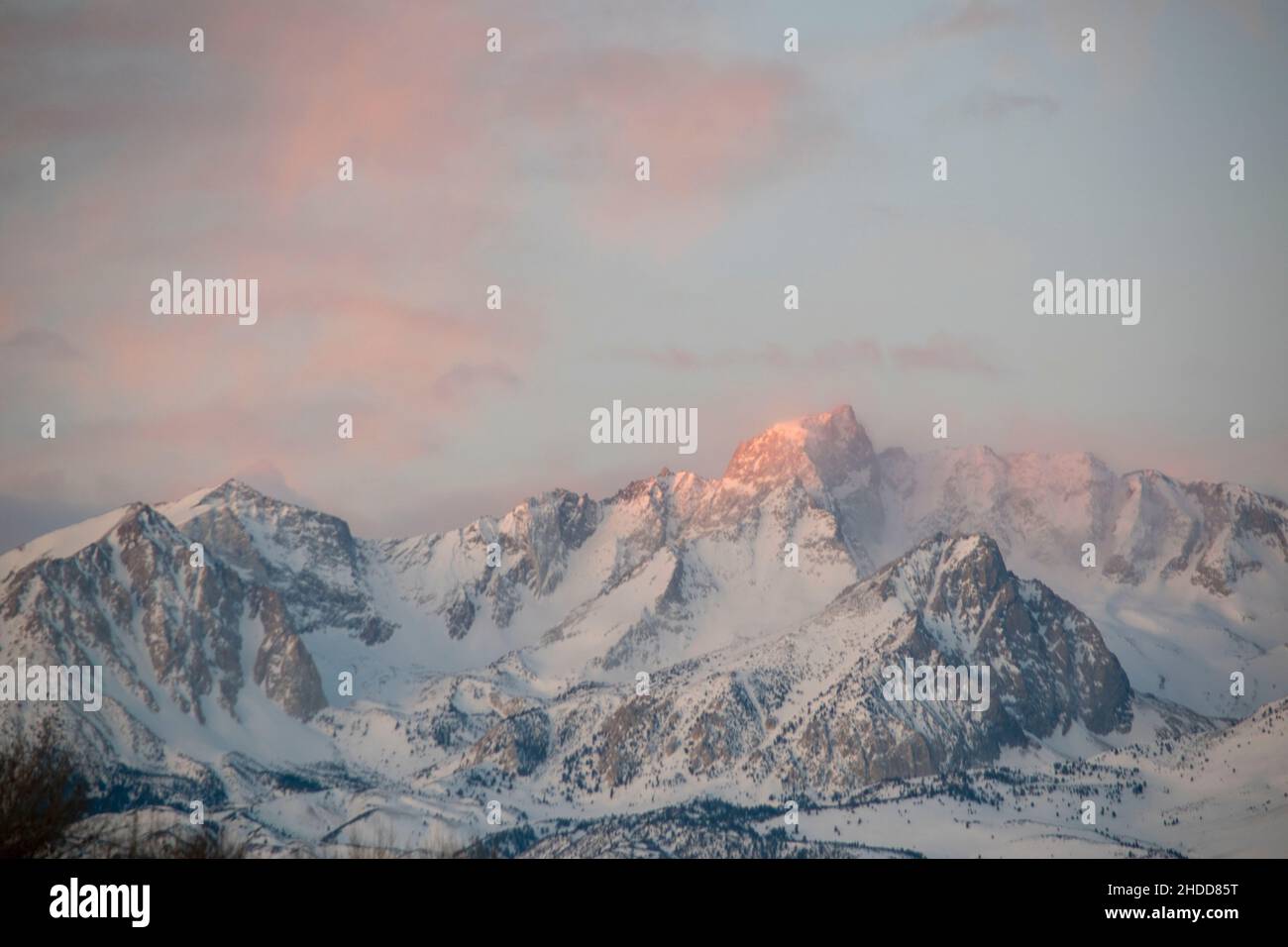 The Eastern Sierra peaks above Bishop, Inyo County, CA, USA light up ...