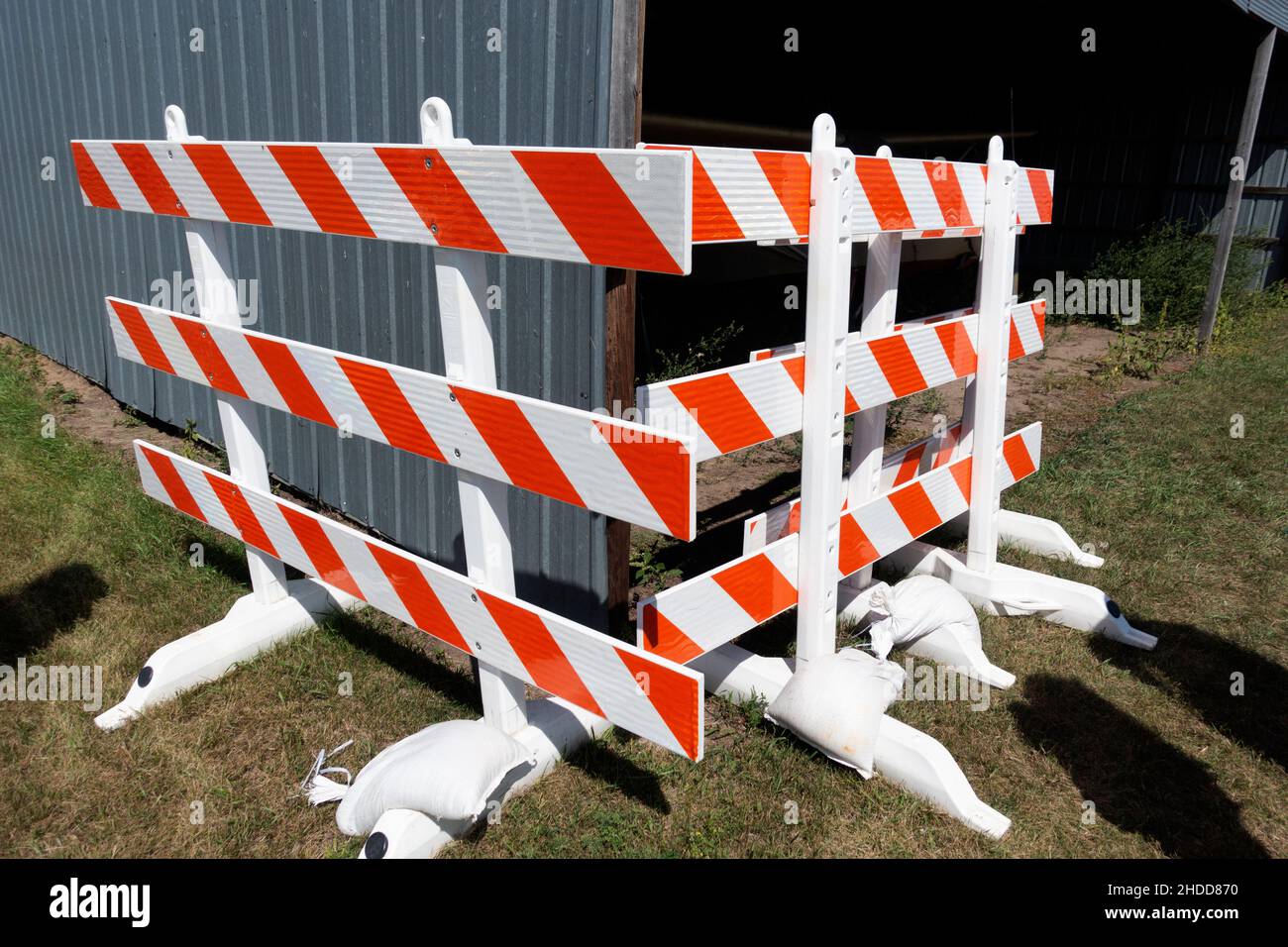 Orange and white striped wooden warning barriers at the Municipal ...