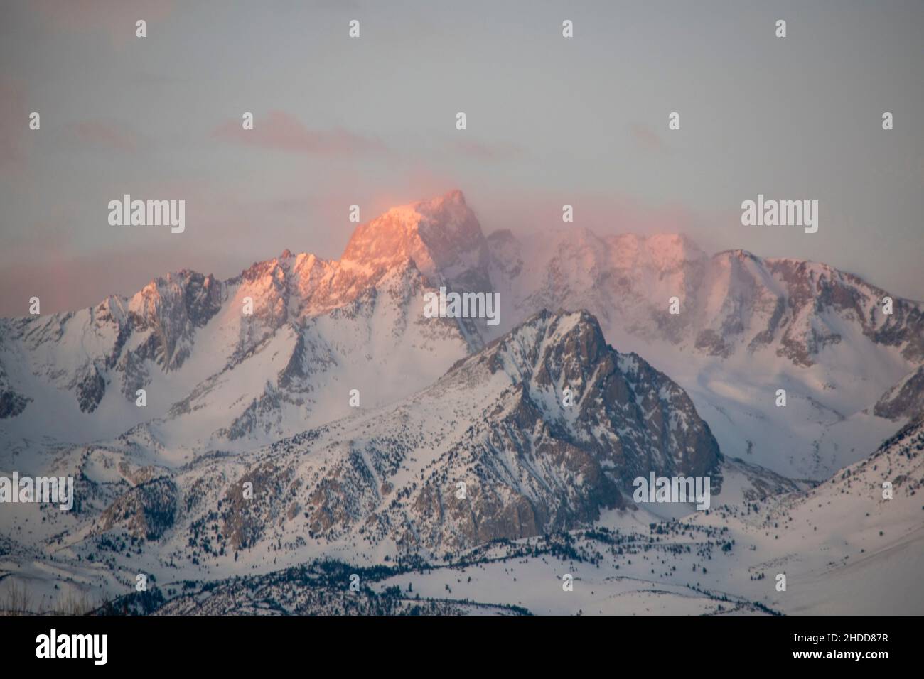 The Eastern Sierra peaks above Bishop, Inyo County, CA, USA light up ...