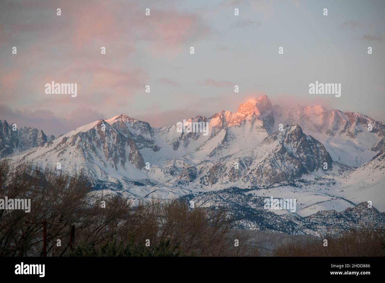 The Eastern Sierra peaks above Bishop, Inyo County, CA, USA light up ...