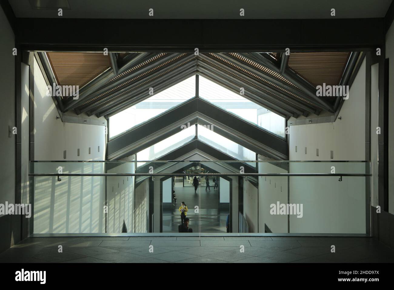 Interior of a buiding with big windows on the ceiling Stock Photo - Alamy