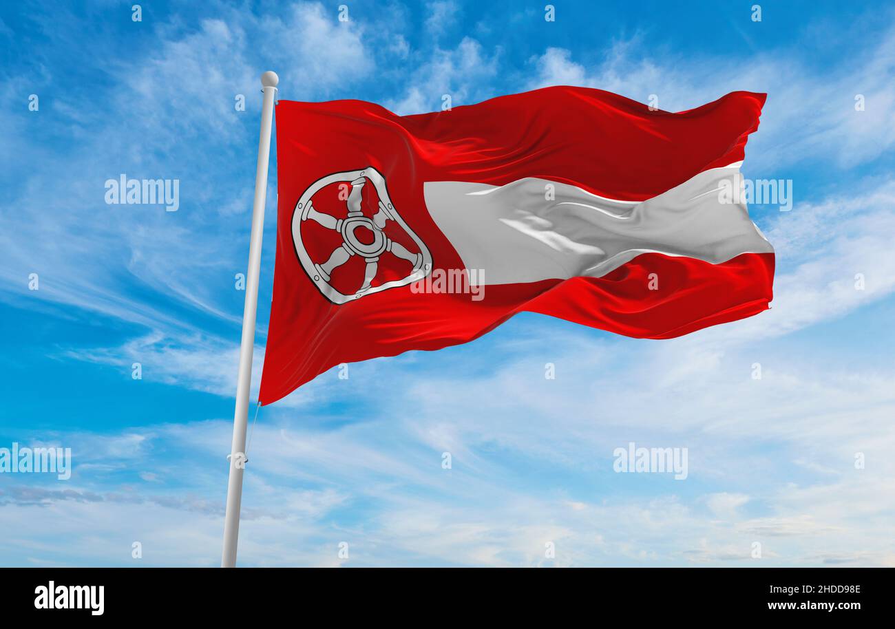 flag of Erfurt laut Hauptsatzung at cloudy sky background on sunset ...