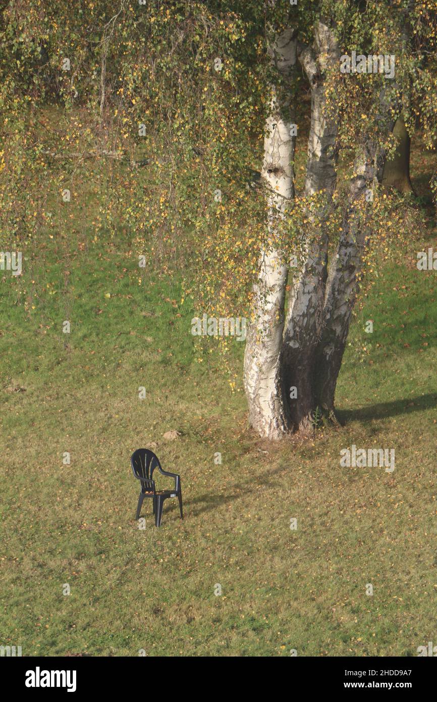 Aerial view of a chair on the lawn in the park Stock Photo - Alamy