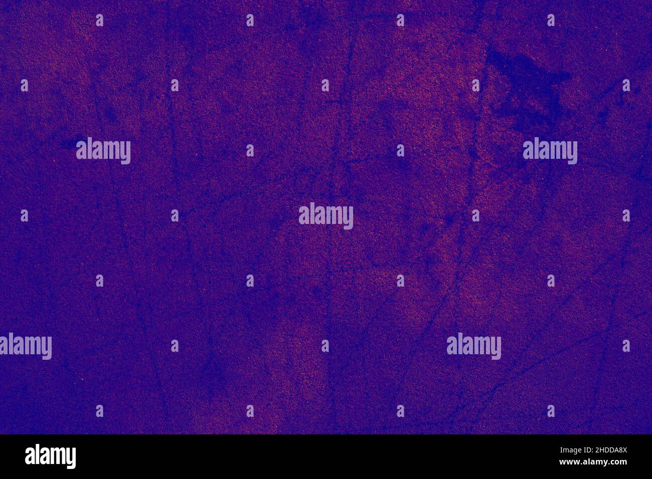 Abstract purple color grunge texture with random scratches on a ...