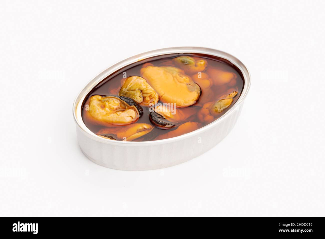 Open can of mussels isolated on white background. Preserving food Stock ...