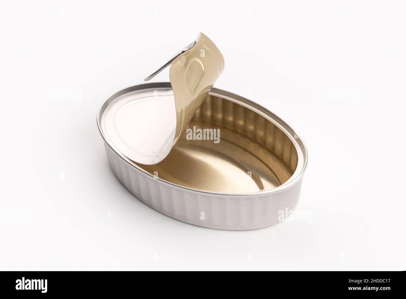 Open food tin can isolated on a white background. Metallic container ...