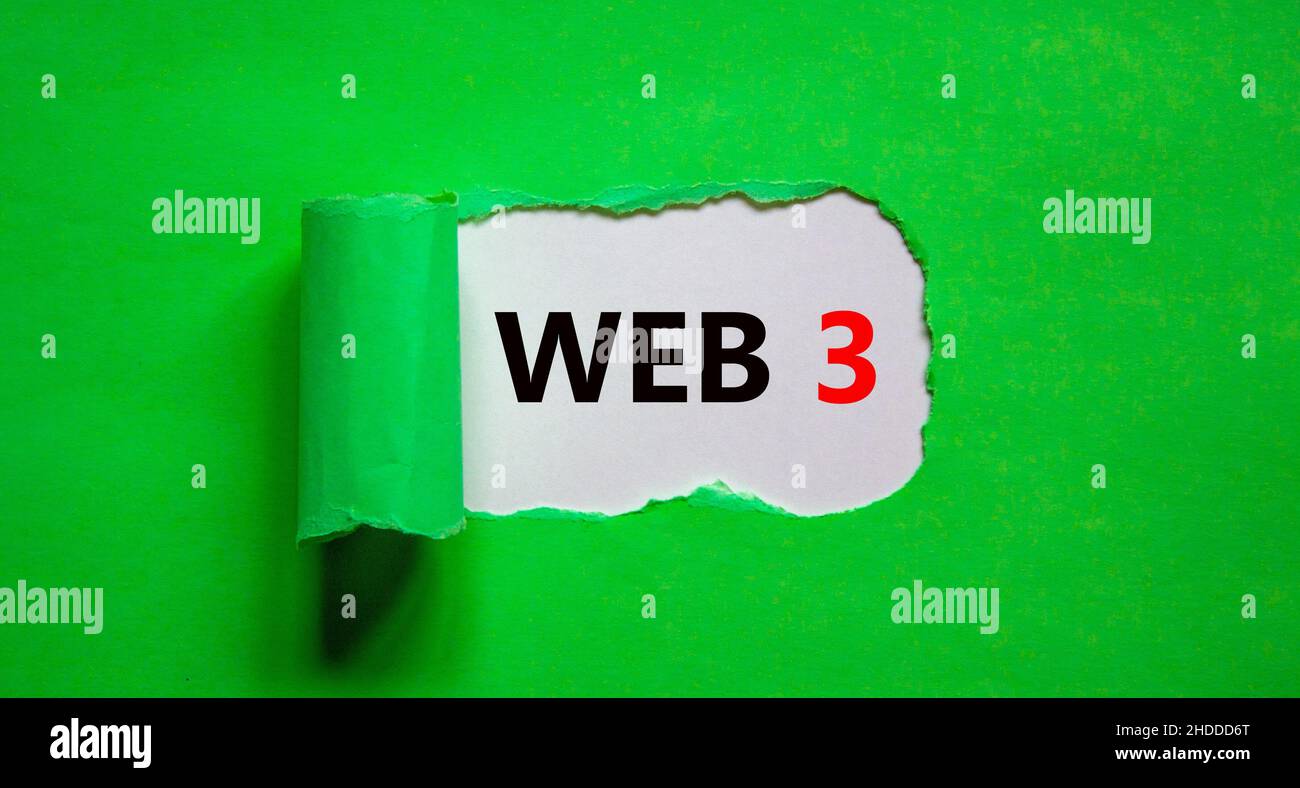 WEB 3 symbol. Concept words WEB 3 appearing behind torn green paper ...