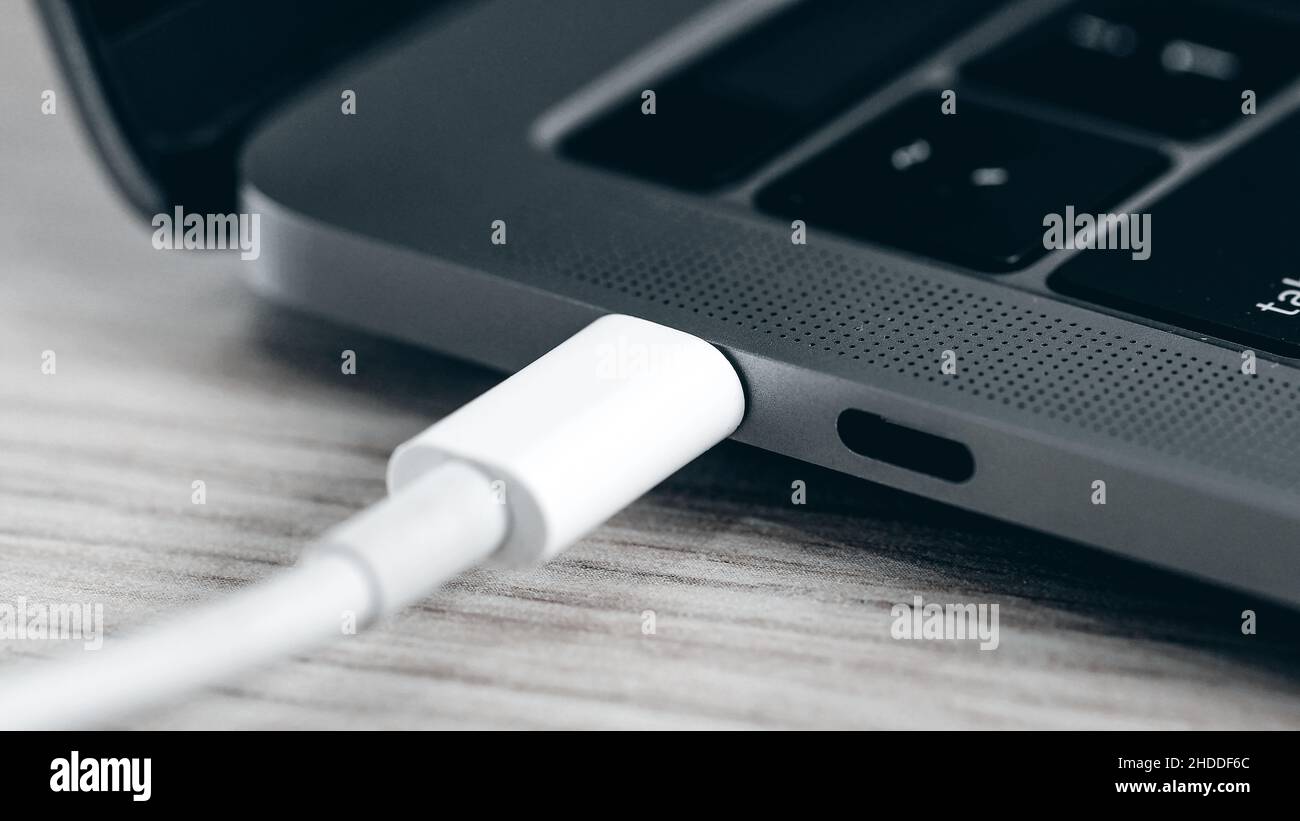 notebook power and data cable connection Stock Photo - Alamy