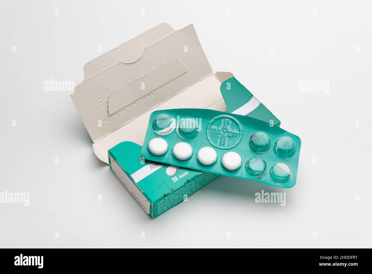 ATHENS, GREECE - DECEMBER 30 2021: Opened Aspirin box with used pill ...