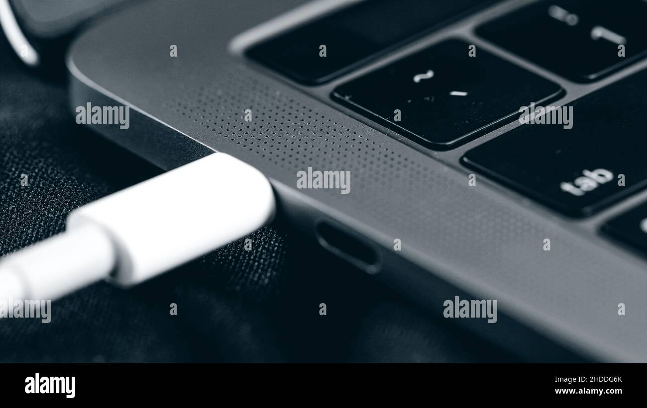 notebook power and data cable connection Stock Photo - Alamy