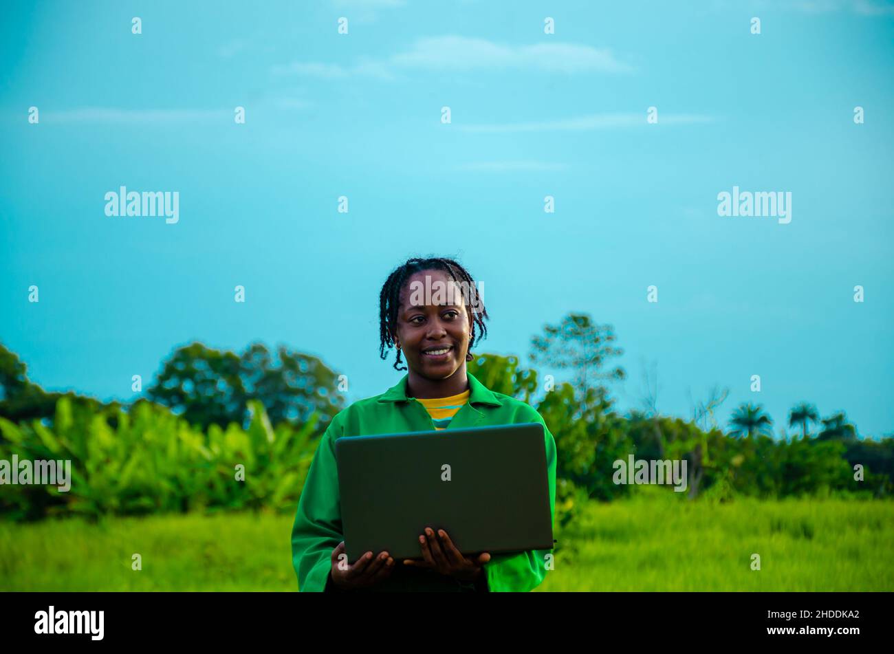 Agronomist using laptop in hi-res stock photography and images - Alamy