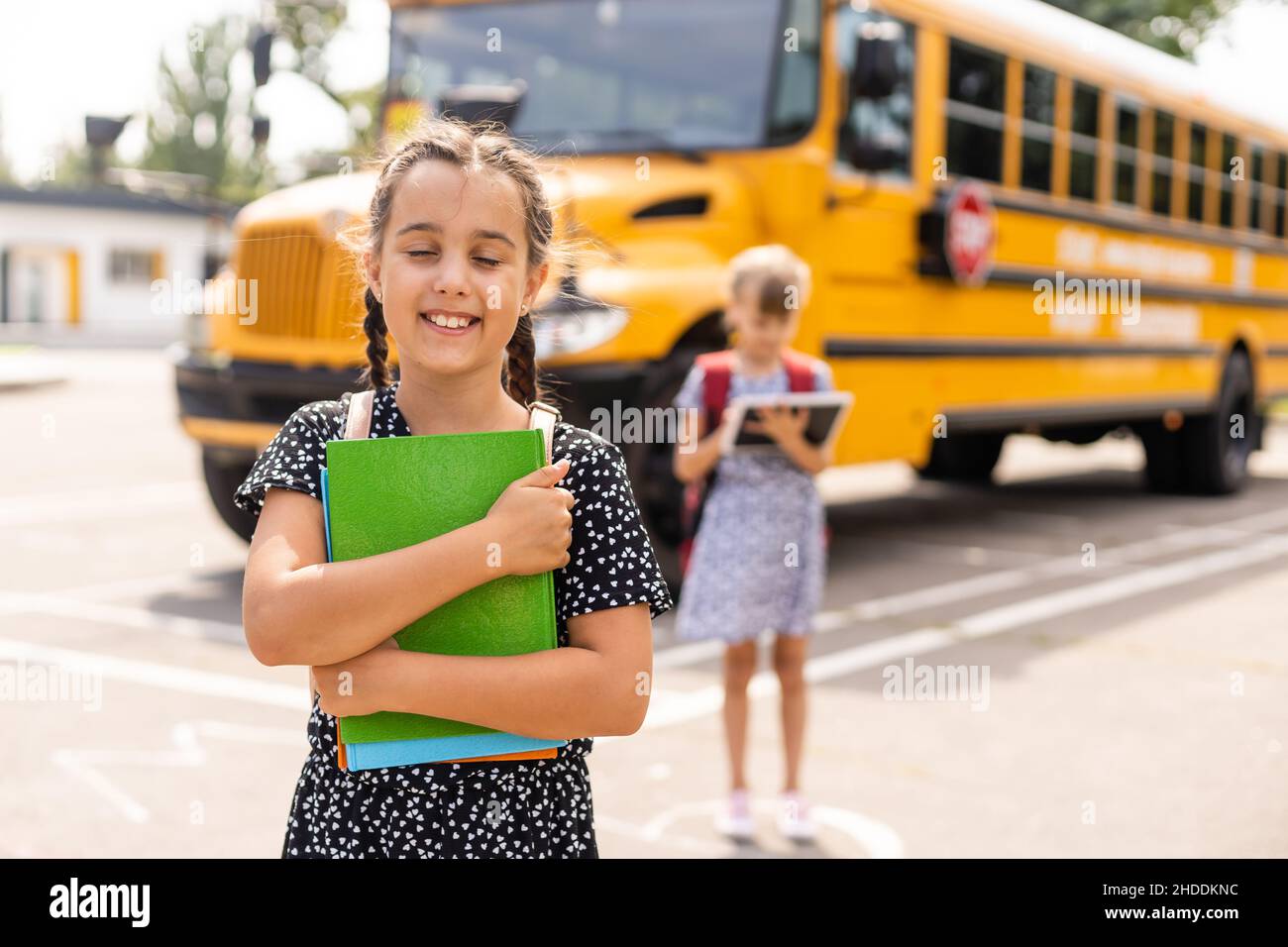Basic school students crossing the road Stock Photo - Alamy