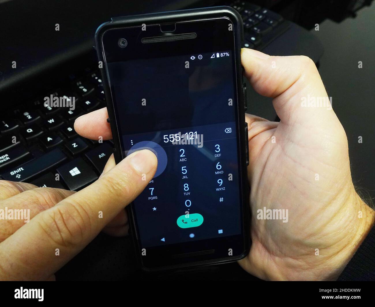 A Close-up Of A Man's Hand Dialing a Cell Phone Stock Photo - Alamy