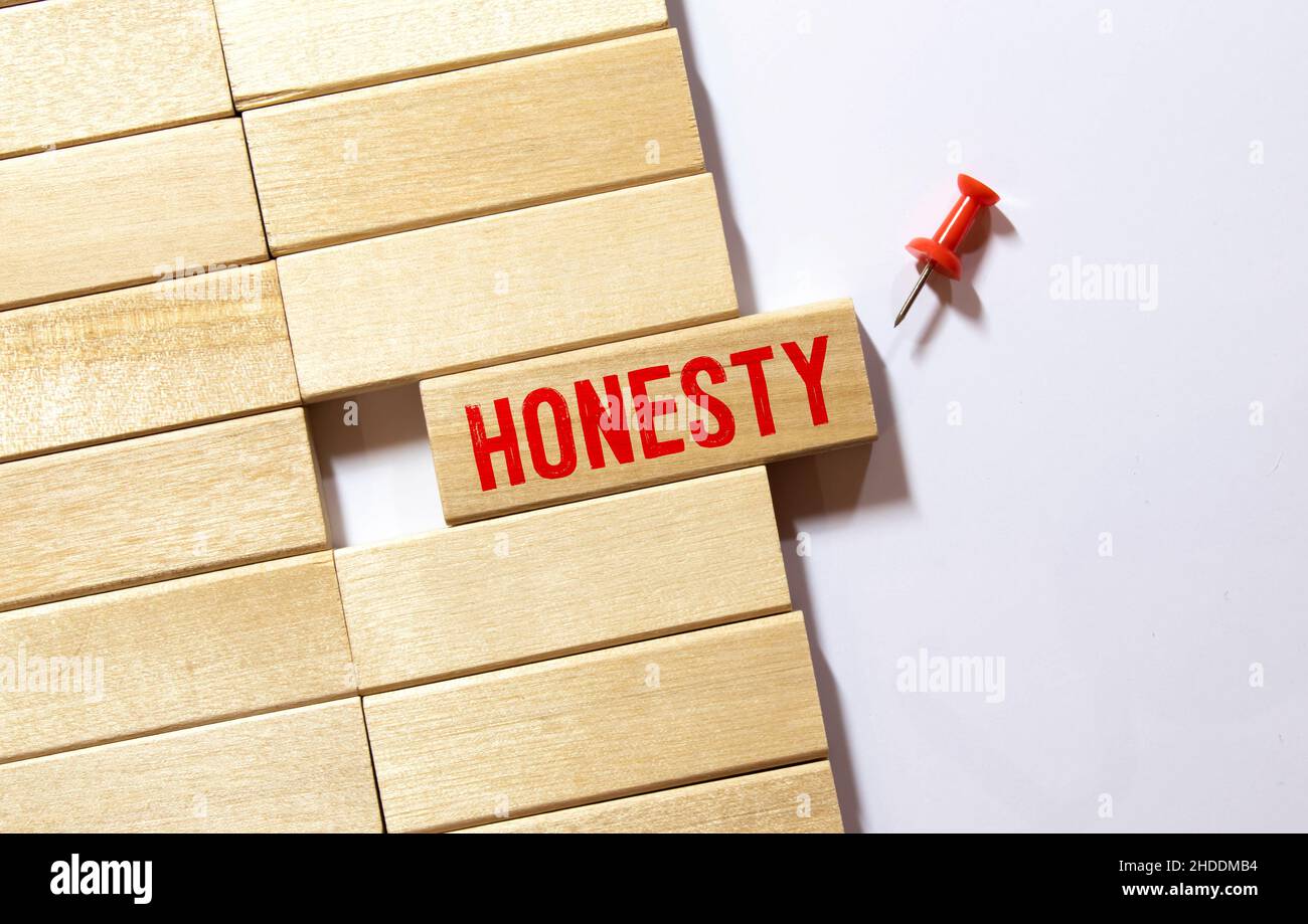 honesty words on wooden blocks on yellow background. Business ethics ...