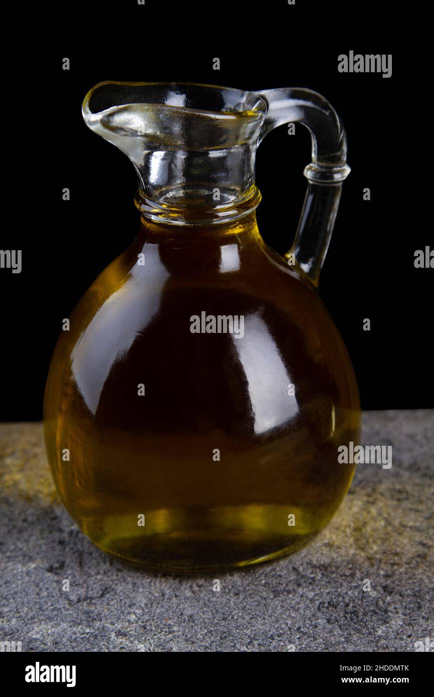 Olive oil in a pouring jar Stock Photo - Alamy