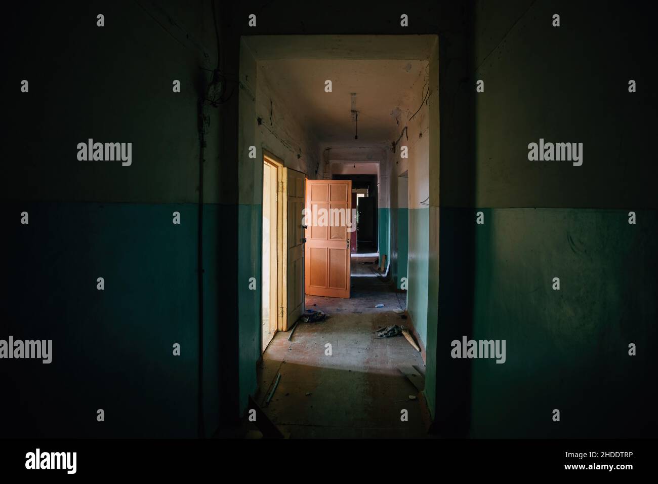 Dark dirty corridor of old abandoned building Stock Photo - Alamy