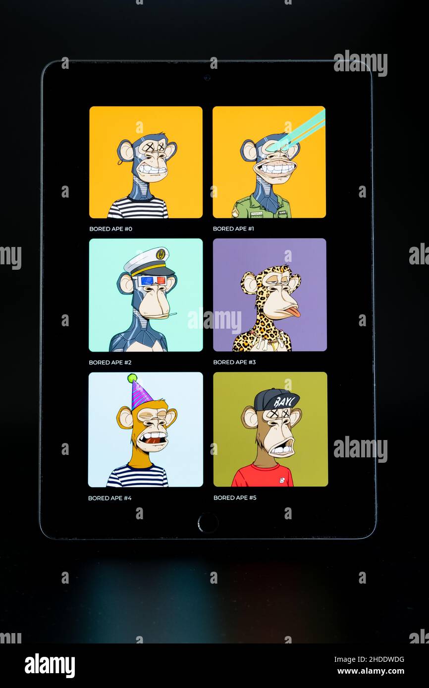 BORED APE NFT digital art collection seen on tablet screen placed on ...