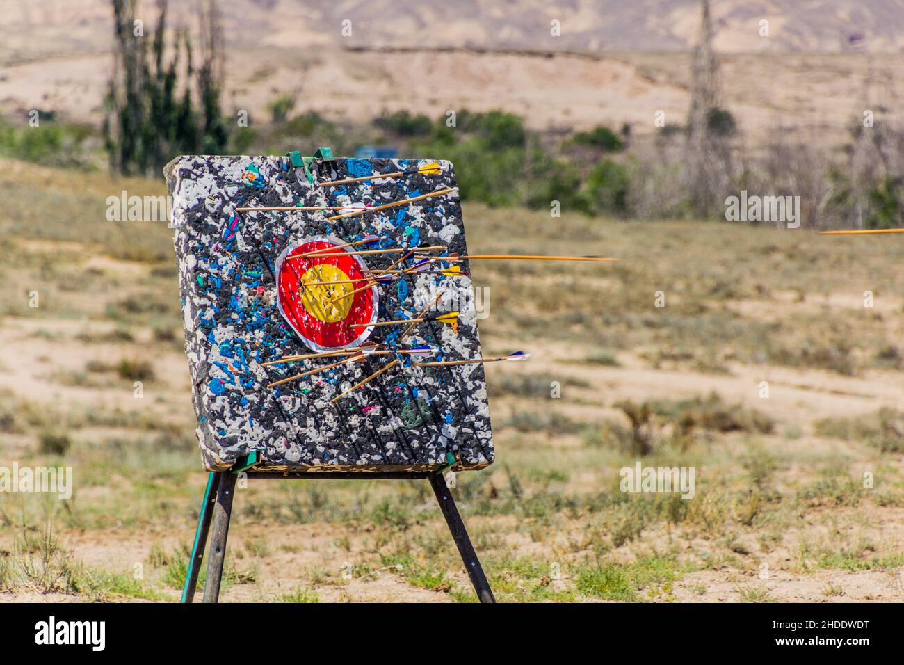 Several arrows in a target Stock Photo - Alamy