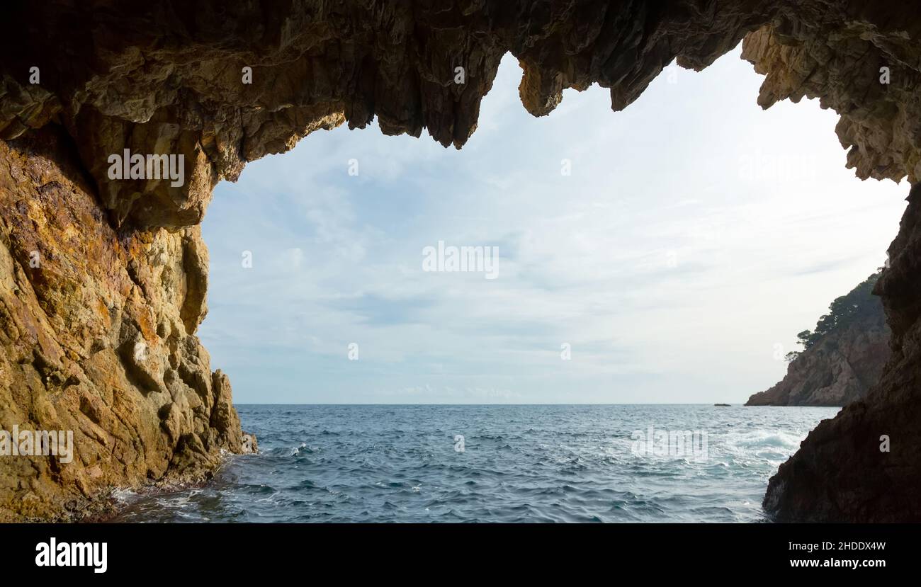 Grottos at coast Stock Photo - Alamy