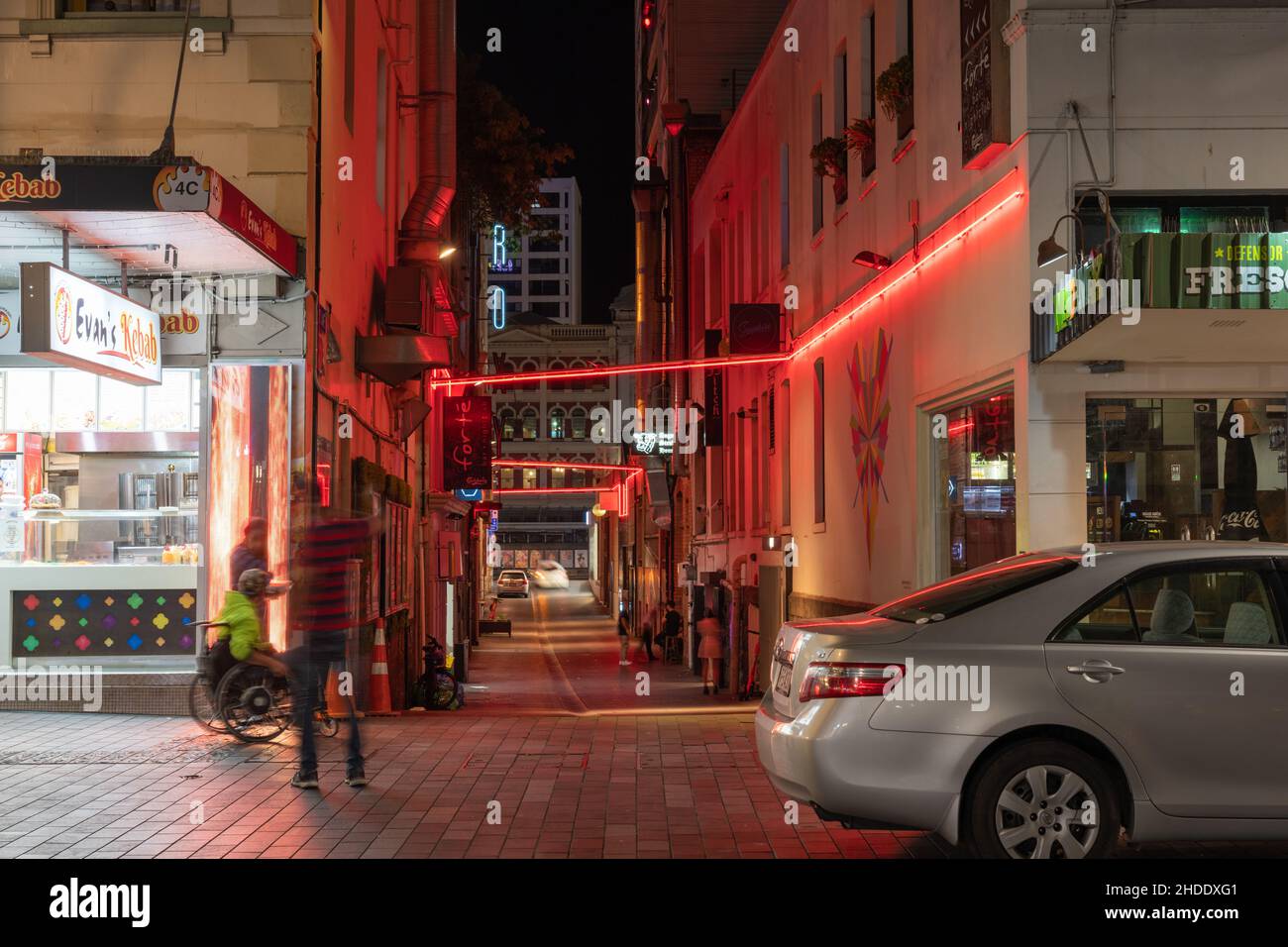 Auckland New Zealand - December 25 2021; City lane with red strip ...