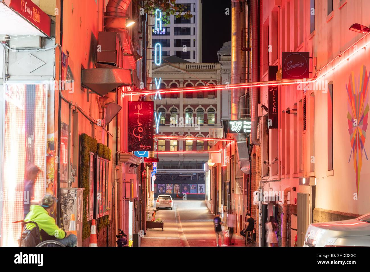 Auckland New Zealand - December 25 2021; City lane with red strip ...
