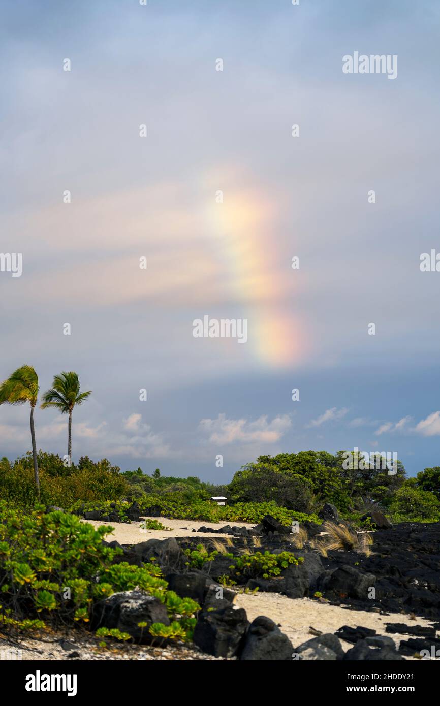 The rainbow over the ocean in Big Island Hawaii Stock Photo - Alamy