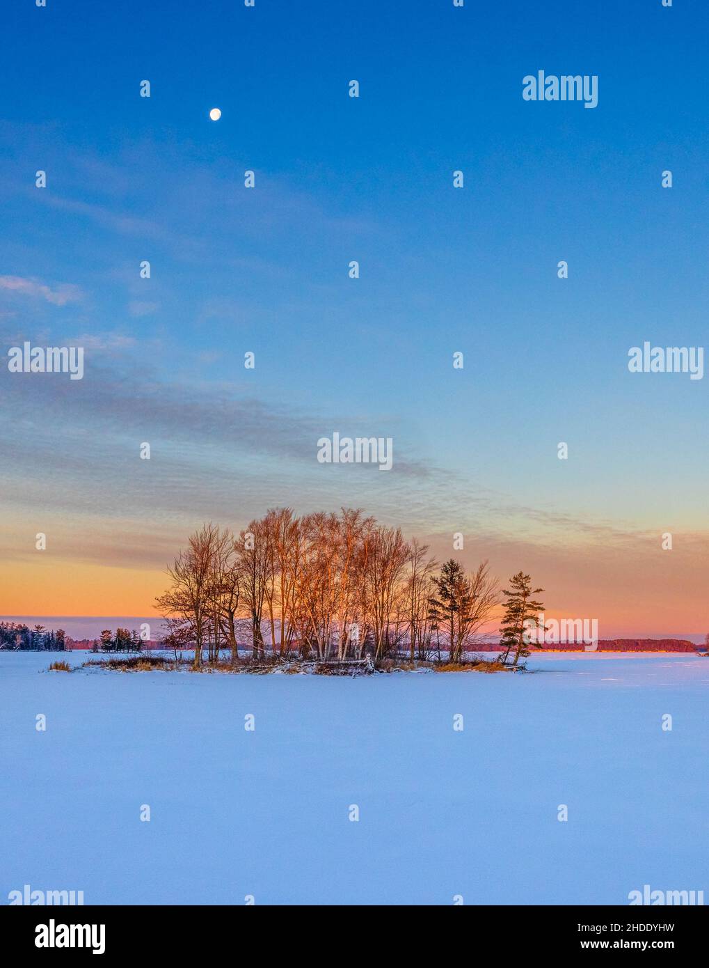 The moon setting on the Chippewa Flowage in northern Wisconsin Stock ...