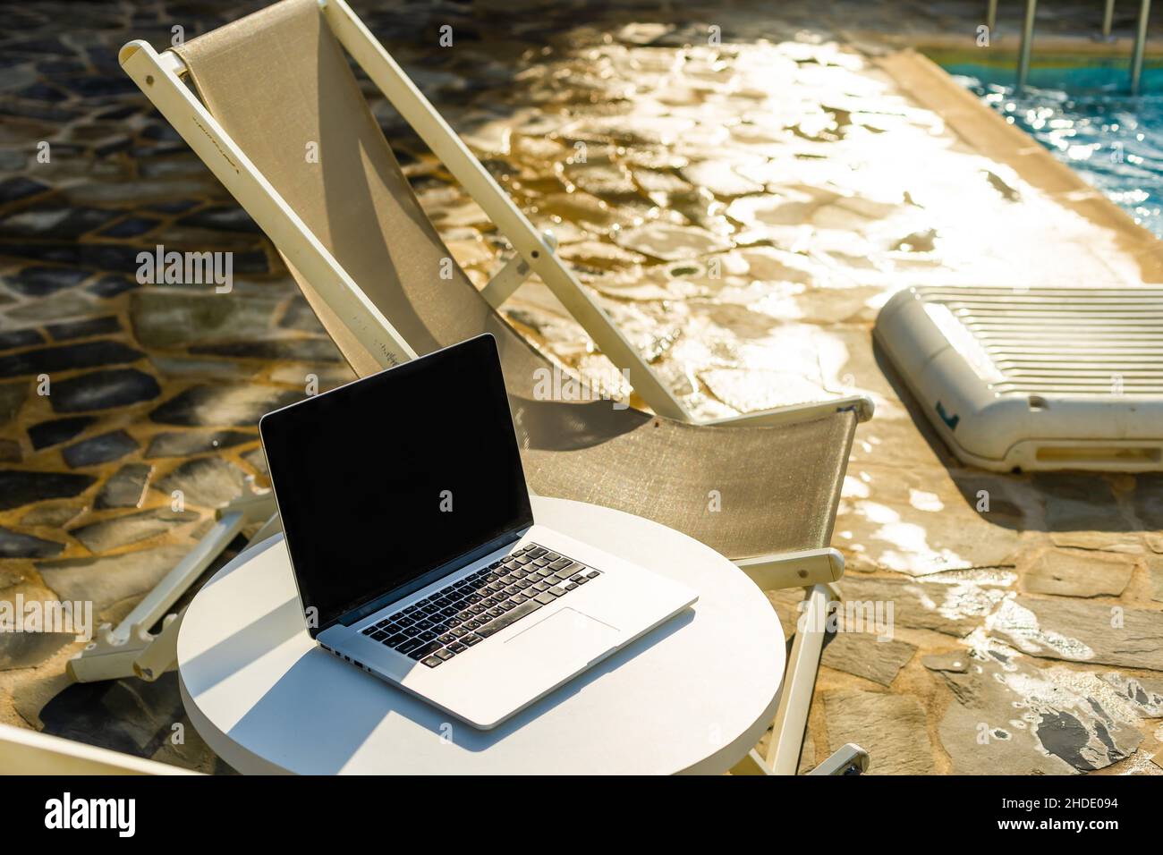 computer on table background as a pool Stock Photo - Alamy