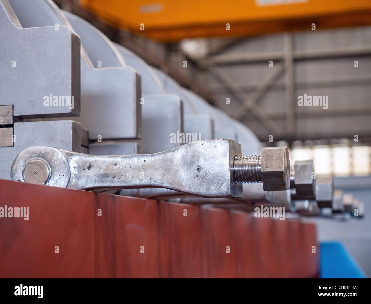 Locking device for the bridge of an industrial twin screw press Stock ...