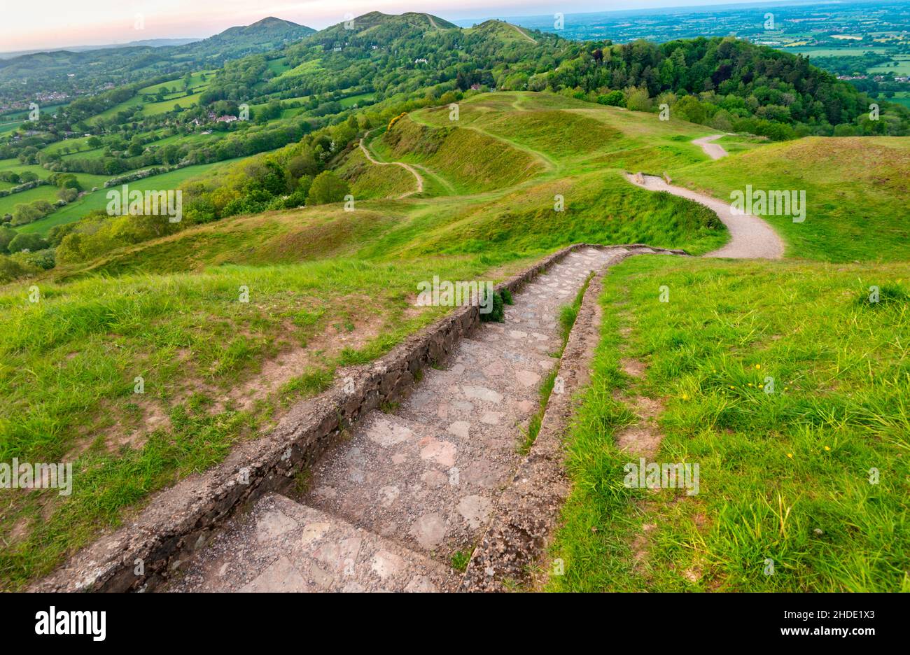 A summer sunrise.The pathway,with steps on the steeper slopes,runs ...