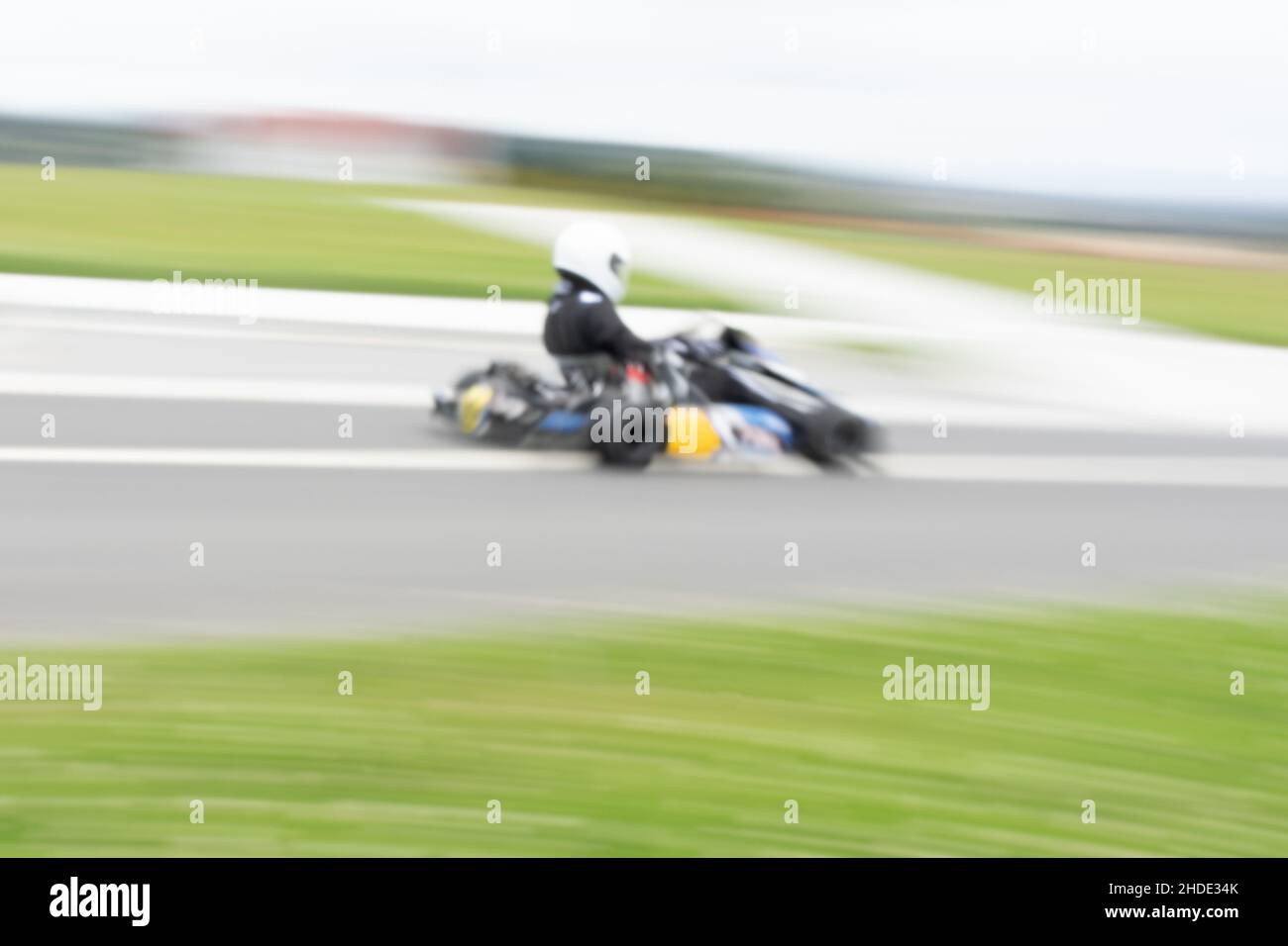 Auckland new Zealand - December 27 2021; Go-kart speeding past in blur ...