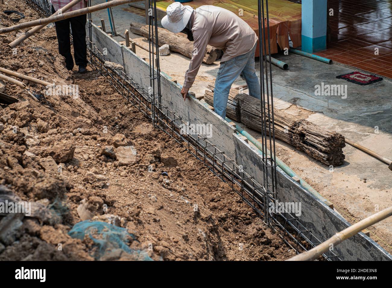 Cement concrete poll in construction site wall building new house ...
