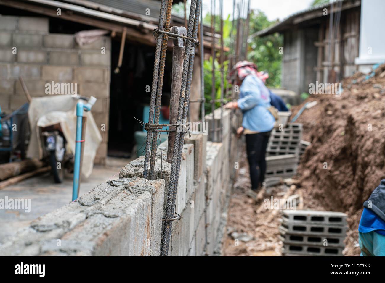 Cement concrete poll in construction site wall building new house ...
