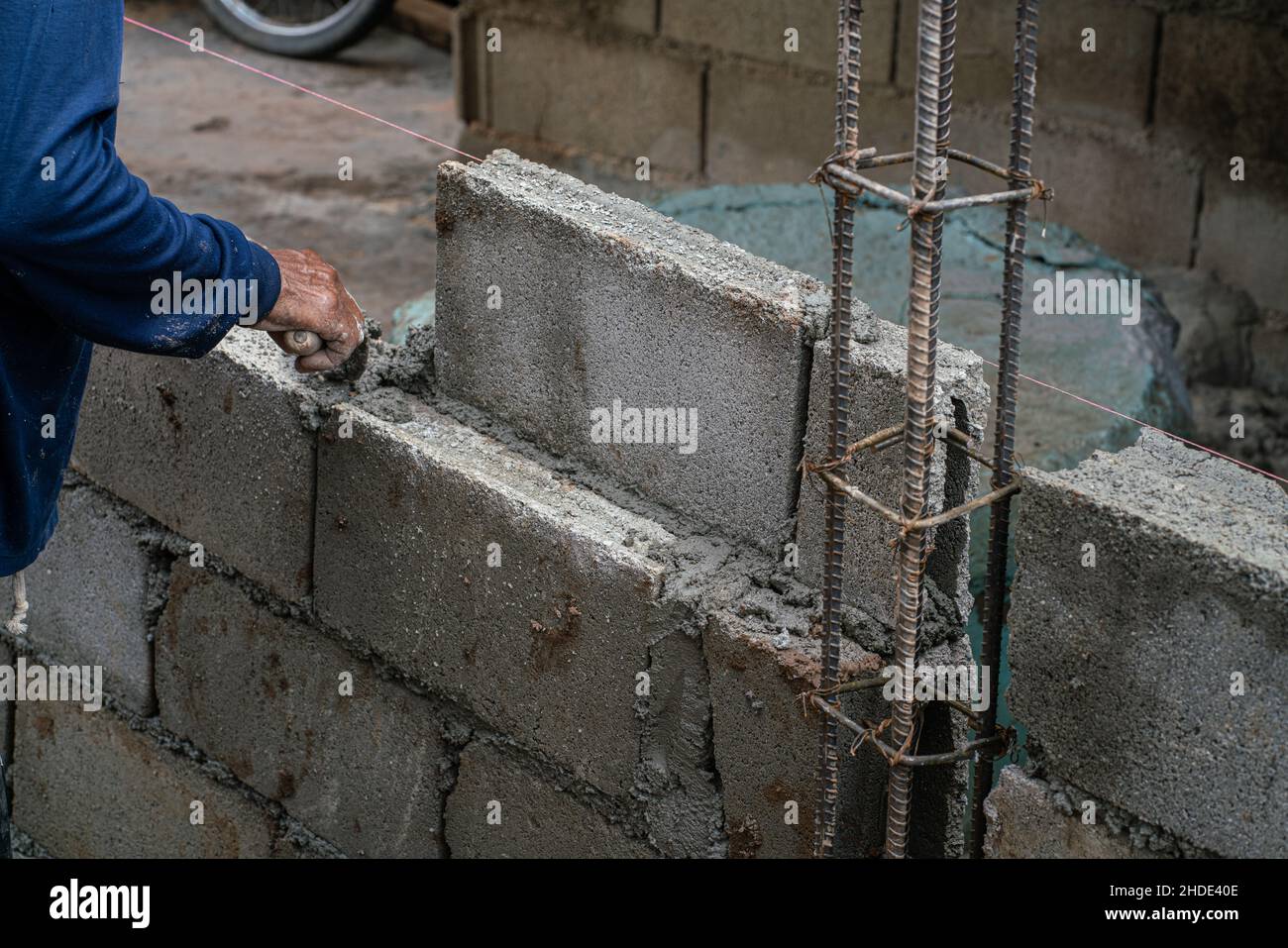 Cement concrete poll in construction site wall building new house ...