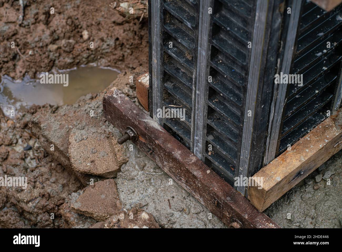 Cement concrete poll in construction site wall building new house ...
