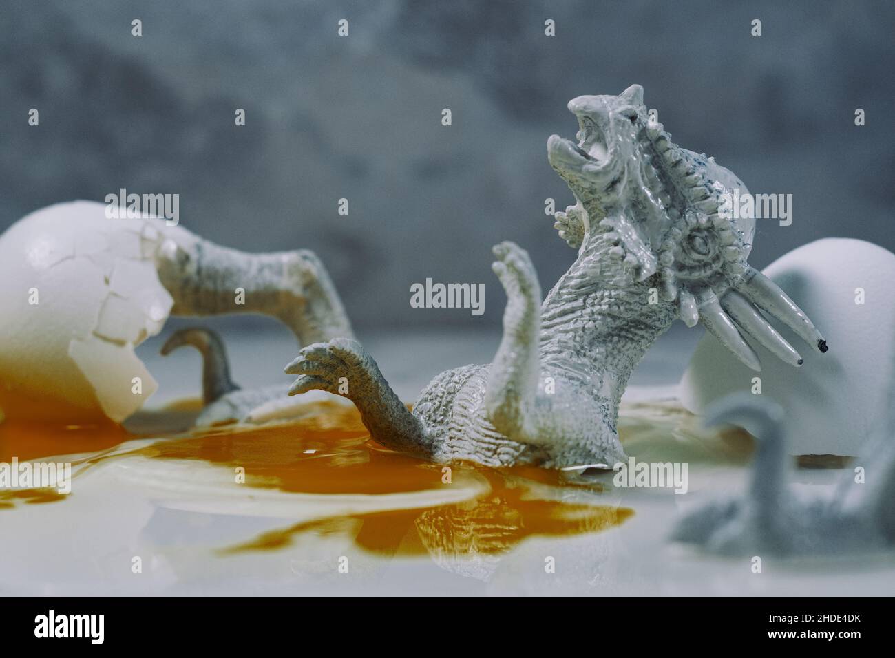 Creepy abstract hatched dead dinosaur egg with yoke concept Stock Photo ...