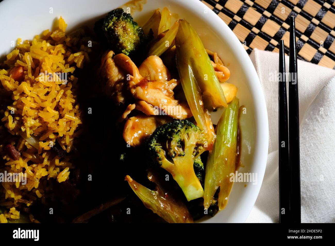 Chinese szechuan garlic chicken combo with pork fried rice Stock Photo ...