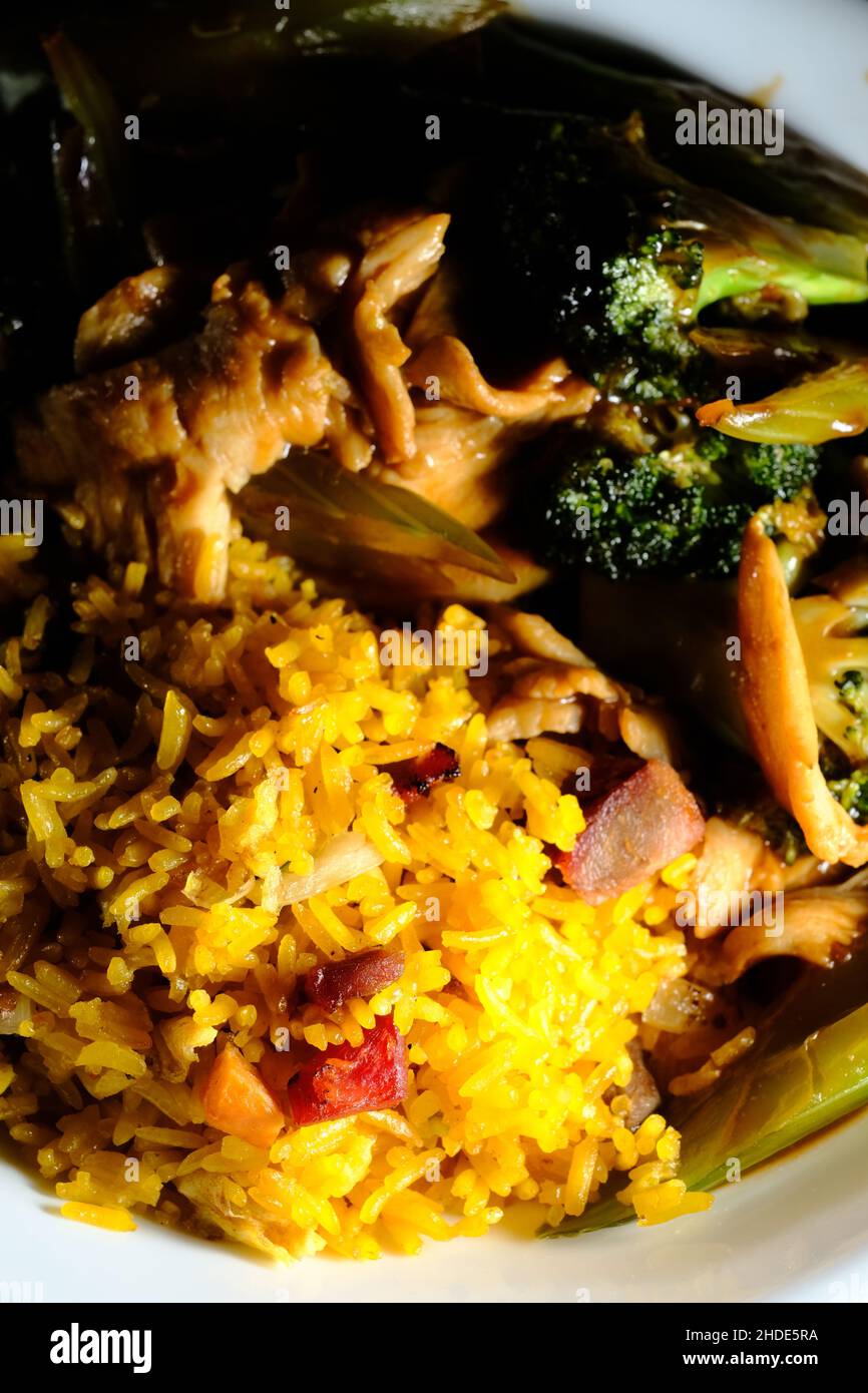 Chinese szechuan garlic chicken combo with pork fried rice Stock Photo ...