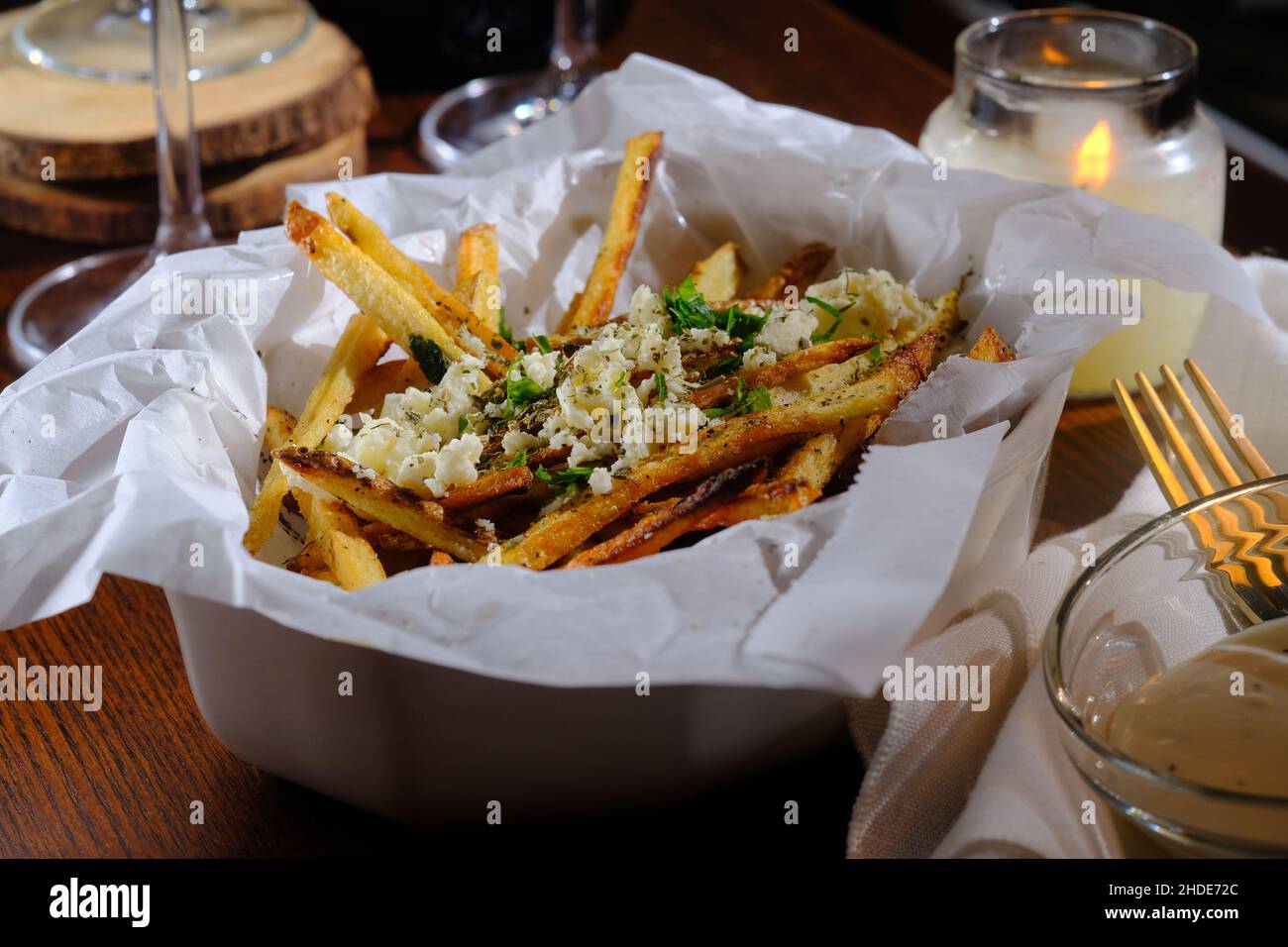 Delicious Mediterranean street cart fried potatoes with feta cheese ...